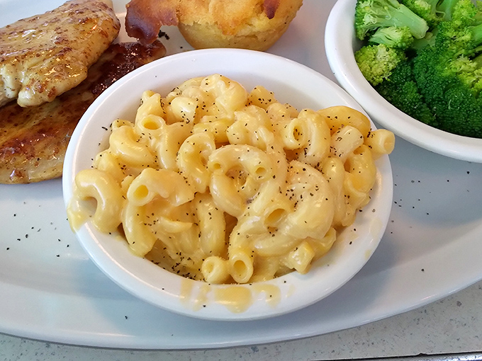 Mac and cheese so creamy it should require a permission slip. This isn't that sad orange boxed stuff—it's the real deal that hugs your soul.