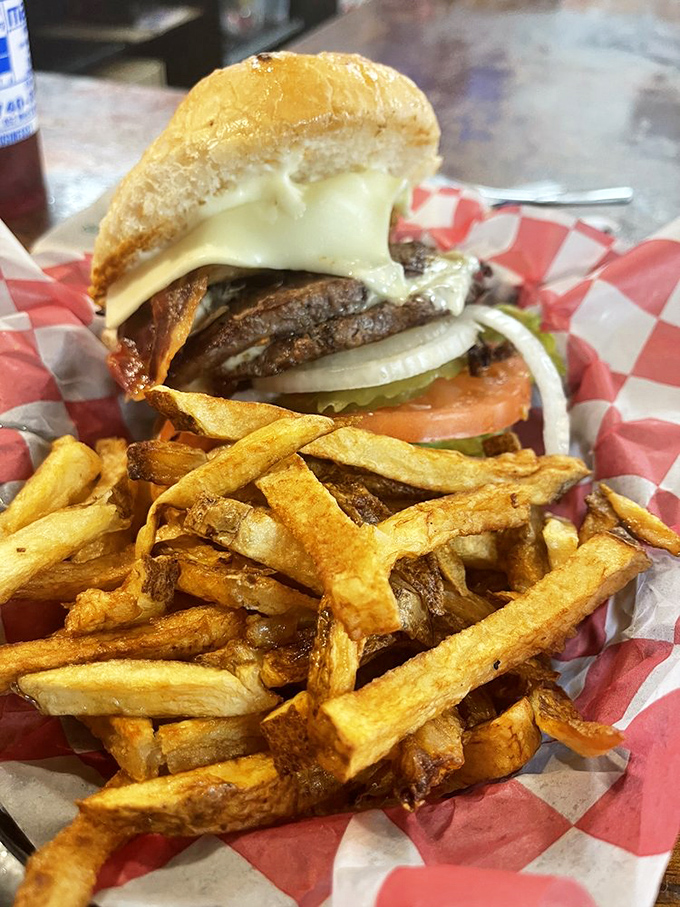 Hand-cut fries with a burger that doesn't need gimmicks – just quality beef, melted Swiss, and mushrooms that have found their true calling in life.