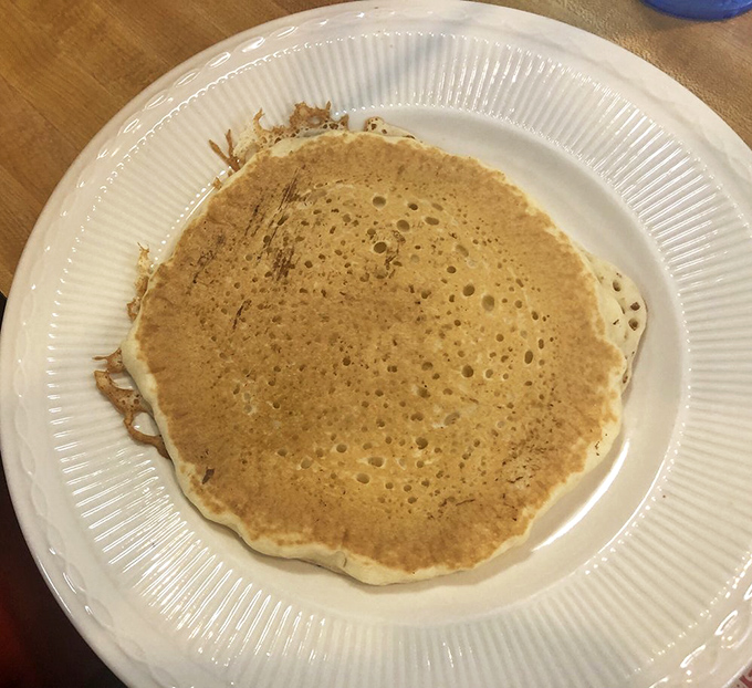 This isn't just any pancake—it's the kind that makes you question why you ever bothered with fancy brunch spots.