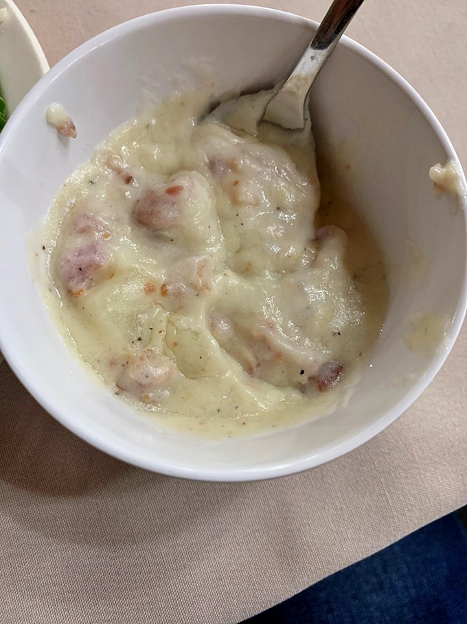 This isn't just potato soup – it's a warm hug in a bowl. Creamy, hearty, and studded with ham that didn't come from a package.