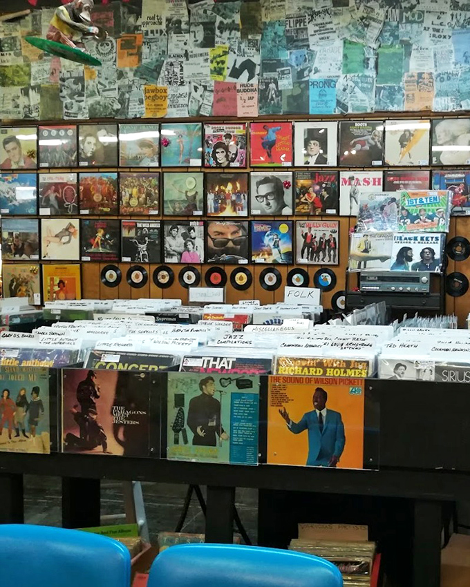 Album heaven for vinyl junkies. That wall could tell the soundtrack of several generations—from Sinatra to The Clash.