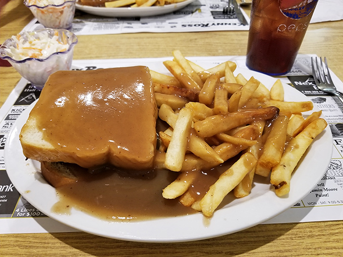 Comfort food that hugs your soul – this hot roast beef sandwich drowning in gravy makes Monday meetings and tax season seem manageable again.