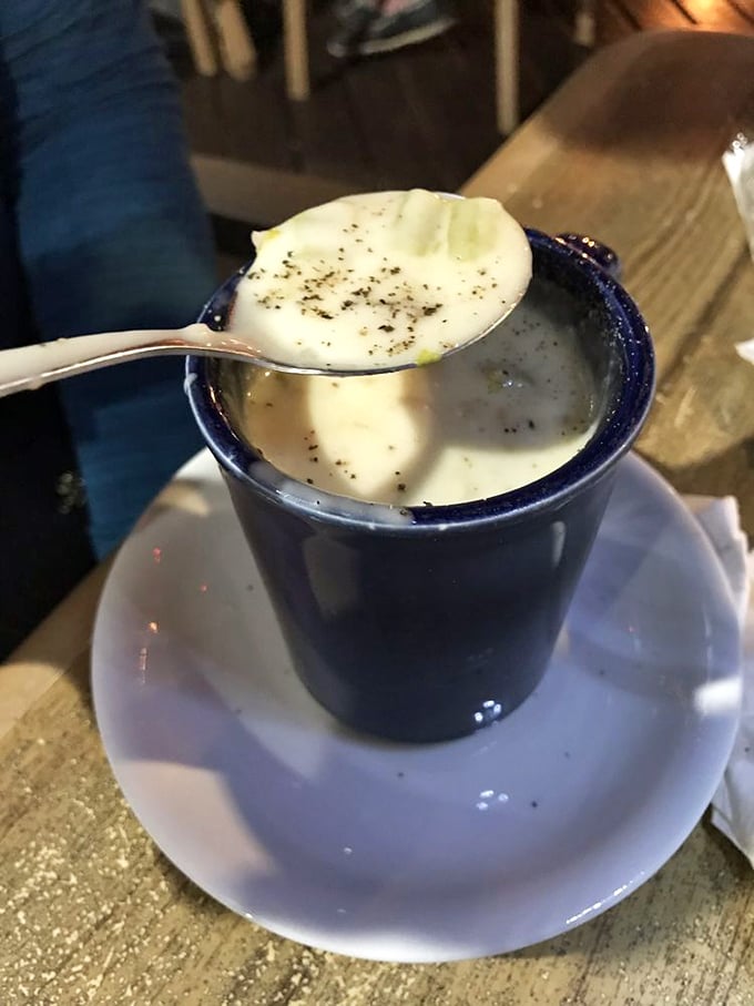 A blue bowl of creamy seafood chowder that warms the soul. Each spoonful is like a hug from the ocean—comforting, rich, and deeply satisfying.