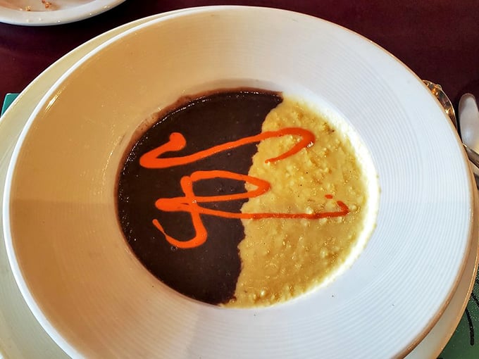 The signature soup duo—like the Southwest's answer to yin and yang. That red pepper sauce swirl isn't just garnish, it's culinary calligraphy.