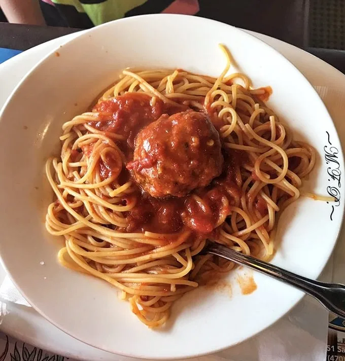 Spaghetti and meatballs – the dish that launched a thousand Italian restaurants. These meatballs look like they've been perfecting their recipe since the Godfather era.
