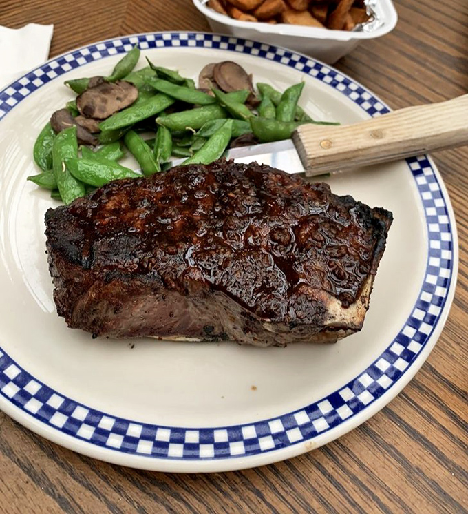 When Wisconsin does steak, it means business—perfectly seared, glazed, and accompanied by snap peas that actually snap.