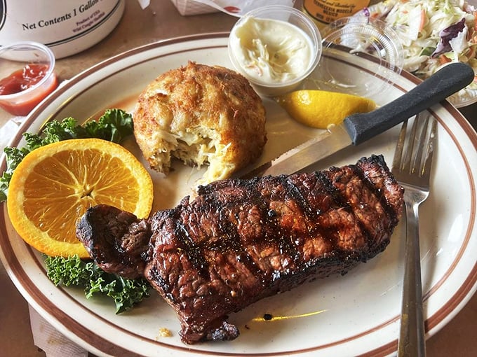 Surf meets turf in perfect harmony—a perfectly charred New York strip alongside a golden crab cake that refuses to be upstaged.