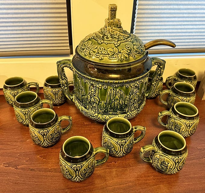 This ornate green punch bowl set isn't just serveware—it's a conversation starter that screams "my home is more interesting than yours."