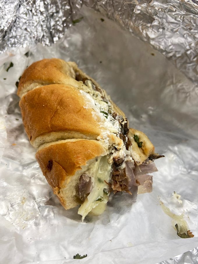 This isn't just a sub – it's a handheld flavor festival wrapped in fresh bread, with cheese stretching like it's trying to win a gold medal.