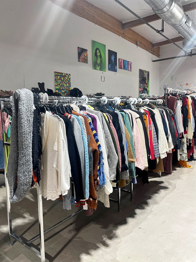 Cozy sweaters hanging like colorful promises of comfort for Arizona's surprisingly chilly winter evenings.