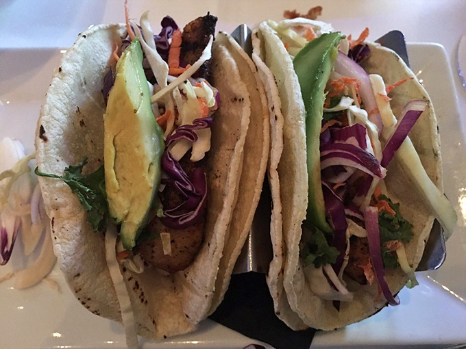 Fish tacos that bring the beach to your table – crispy, fresh, and colorful enough to make you forget you're miles from the coast.
