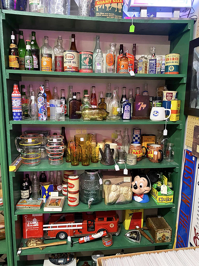 From motor oil to Mickey Mouse, this green shelf tells America's story through bottles and trinkets that once populated our grandparents' everyday lives.