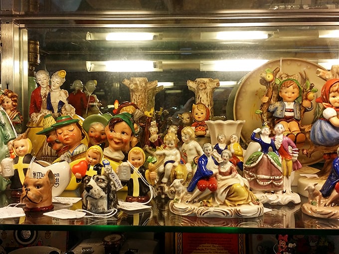 Ceramic figurines frozen in permanent smiles, silently judging your fashion choices while waiting for their forever homes.
