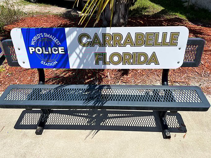 Even the world's smallest police station needs a waiting area - complete with commemorative bench seating.