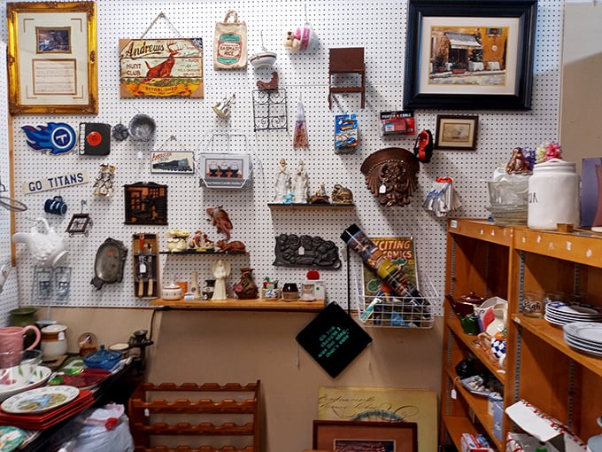 Wall-to-wall nostalgia on pegboard display. Spot the Titans memorabilia among vintage treasures that transform bare walls into personal museums.