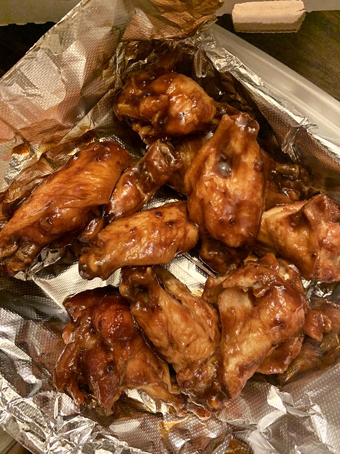 These wings aren't just coated in sauce – they're baptized in it. The kind of sticky-fingered experience worth every napkin.