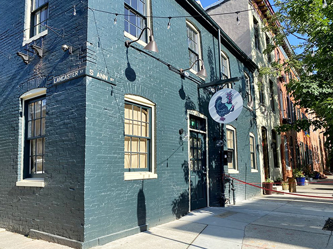 This historic blue corner building holds secrets worth discovering – mainly involving perfectly crispy chicken skin.