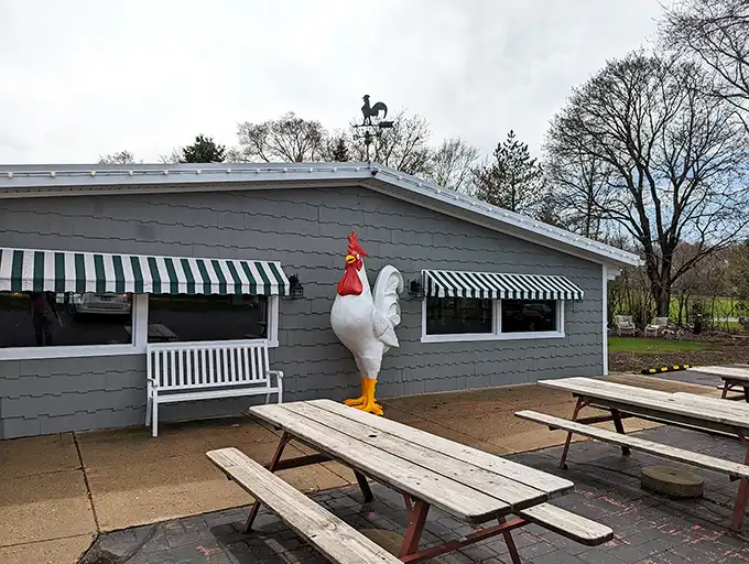 Crandall's playful exterior hints at the fun inside. That giant rooster isn't just decoration – it's a promise of poultry perfection.