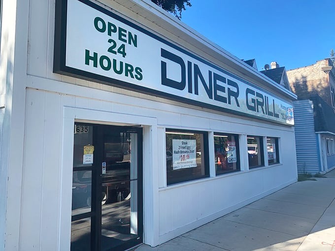 Diner Grill's "OPEN 24 HOURS" sign – three beautiful words for night owls and early birds alike.