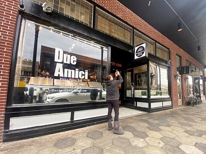 Due Amici's classic black signage promises "REAL NY PIZZA" without the subway fare. The kind of place that makes transplanted New Yorkers weep with joy.