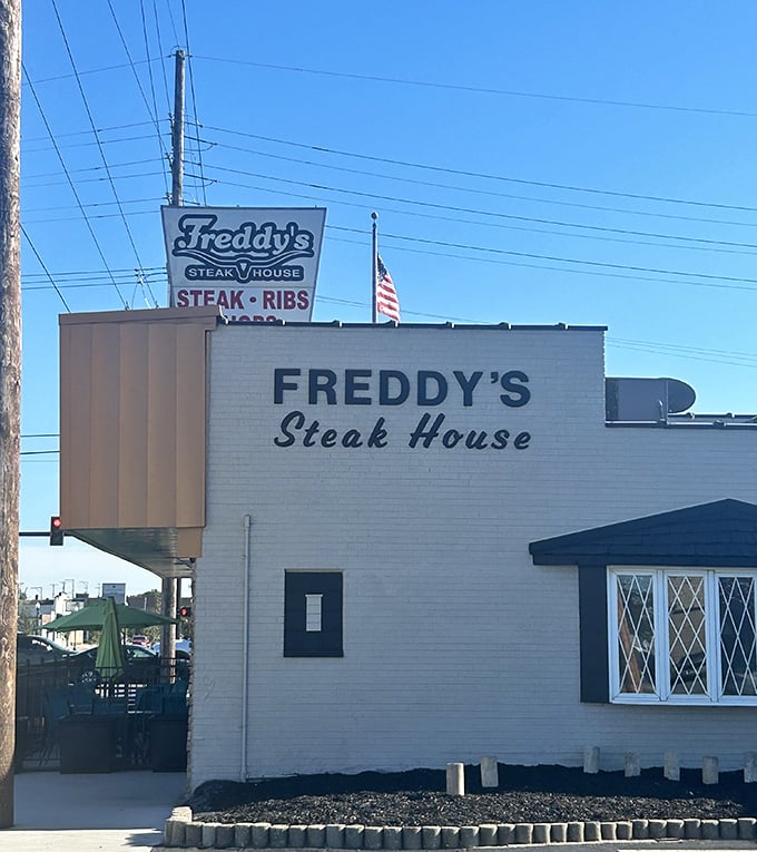 Freddy's classic white exterior and vintage sign promise an old-school steakhouse experience that never goes out of style.