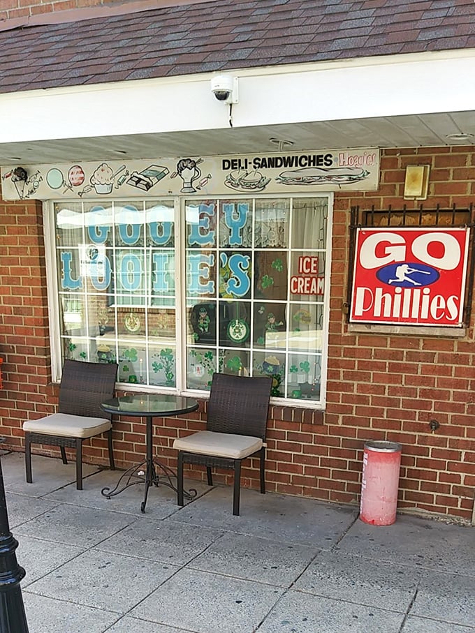 Gooey Looies keeps it simple: brick facade, Phillies pride, and cheesesteaks that live up to that wonderfully descriptive name.