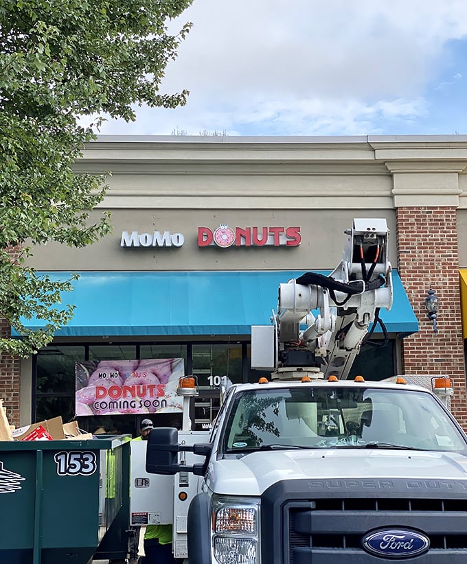 Bright blue awning and modern styling hint at donuts that respect tradition while embracing innovation.