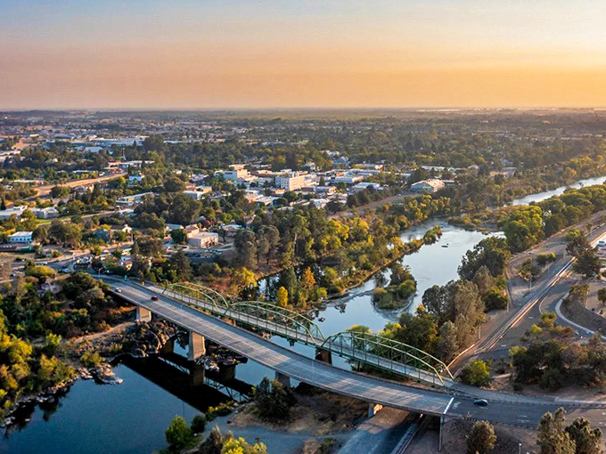 Oroville's bridge spans the Feather River, connecting retirees to affordable living with a side of natural beauty.