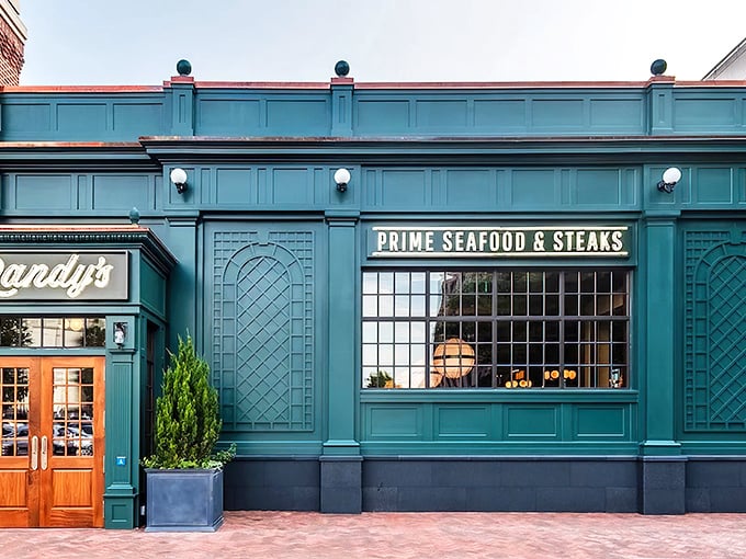 Randy's teal exterior stands out like a peacock in a chicken coop. Behind those windows, prime cuts await their moment of glory.