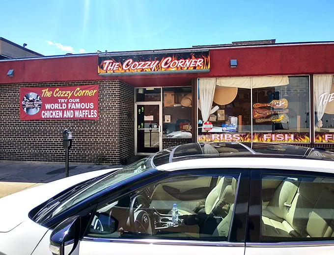 Bold red walls and an even bolder claim – "World Famous Chicken and Waffles" that actually deserves the title!