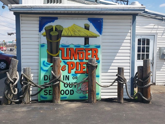 Under the Pier's whimsical sign promises a taste of the shore. Those dock pilings say "drop anchor and stay awhile."