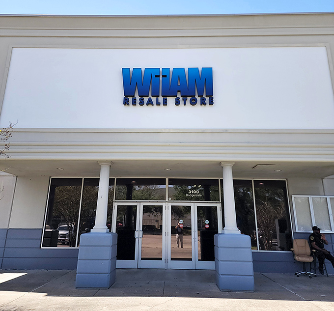 WHAM's clean, modern facade with glowing blue signage looks more like a boutique than a bargain hunter's paradise.