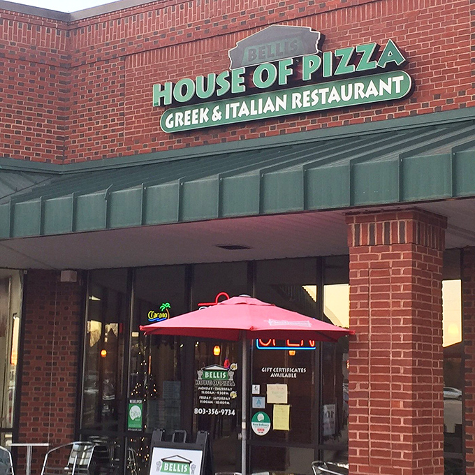 Those colorful umbrellas aren't just for show—they're signaling that something worth celebrating is happening inside this Lexington pizza joint.