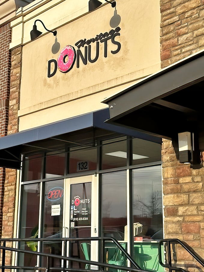 That pink donut in the logo is like a bullseye for your sweet tooth. Heritage Donuts' clean storefront promises no-nonsense donut perfection.