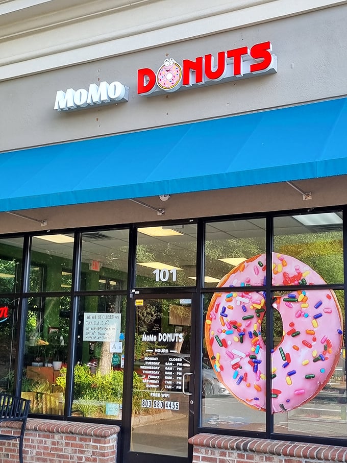 That giant donut window display isn't subtle – and honestly, why should it be?