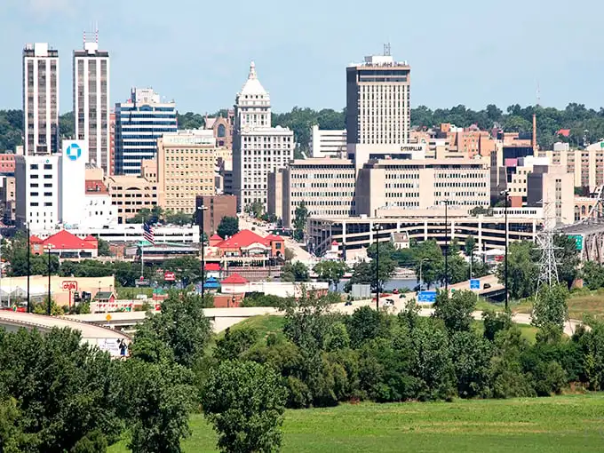 Downtown Peoria stands tall and proud, a metropolitan island surrounded by the heartland's endless fields and flowing waters.
