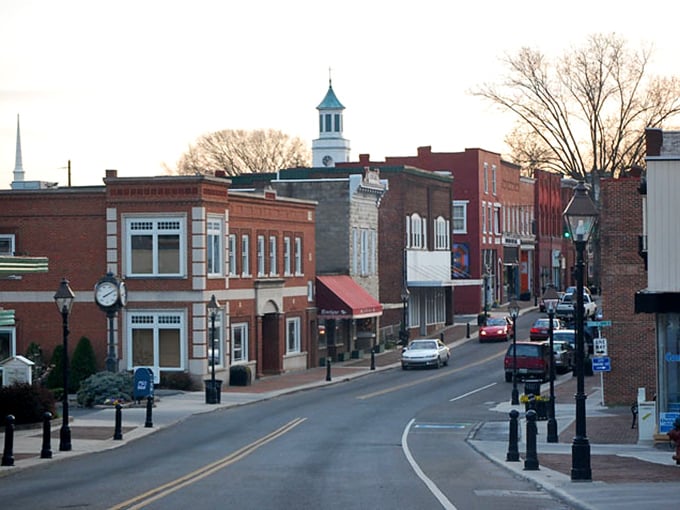 Sunset casts a golden glow on Rogersville's Main Street – where modern life respectfully takes a back seat to tradition.