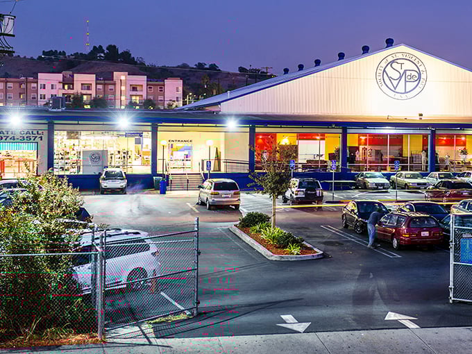 The evening glow transforms this thrift giant into something almost magical. Daytime bargains, nighttime charm.