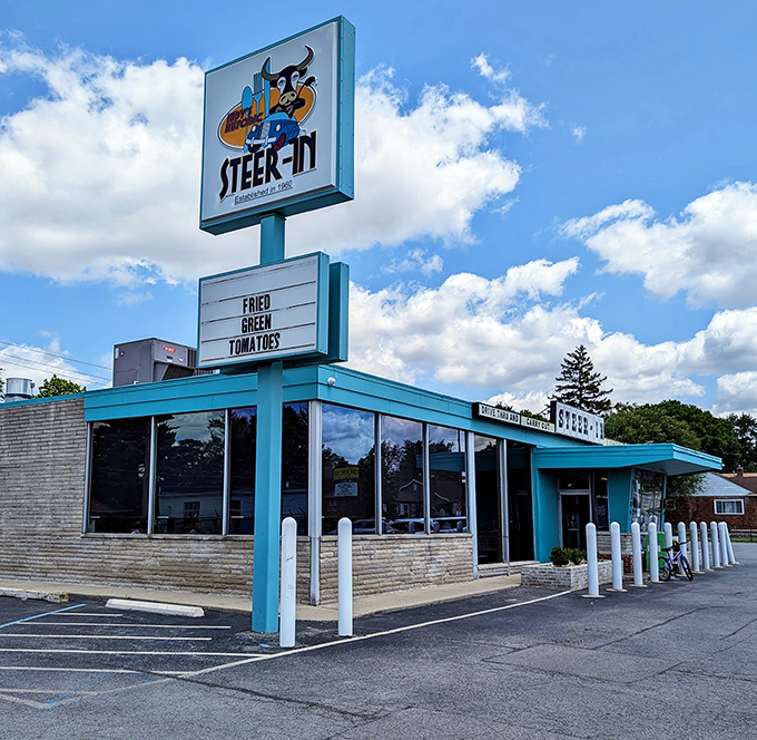 The Steer-In's retro sign still herds hungry Hoosiers toward happiness, one steakburger at a time.