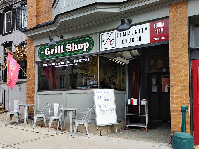That whiteboard outside The Grill Shop isn't just a menu – it's a love letter to hungry passersby saying "Eat Out or Take Home" – both excellent life choices.