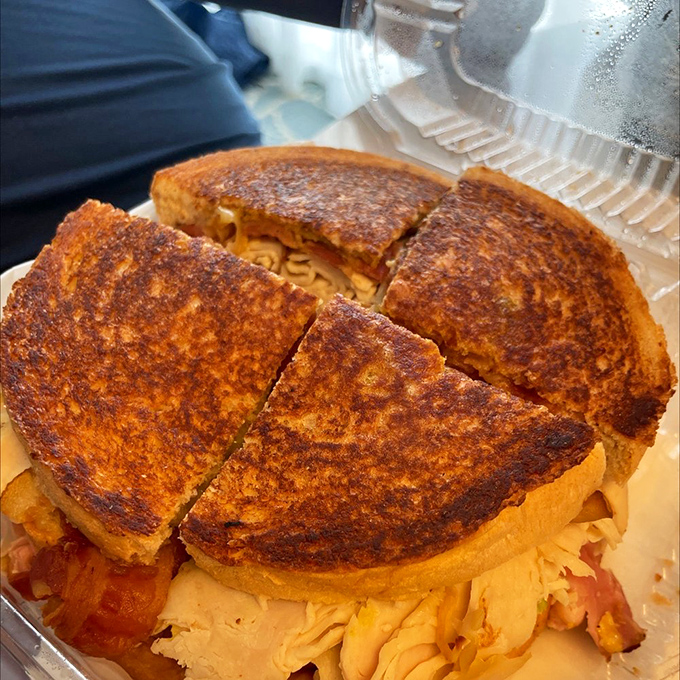 The 1915 Club sandwich isn't just lunch—it's a time machine disguised as food. Those layers tell stories of Tampa's culinary heritage.