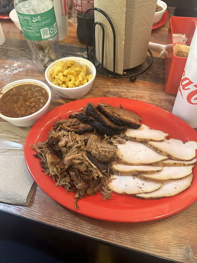 The three meat combo—because choosing just one would be like picking a favorite child. Smoky diplomacy at its finest.