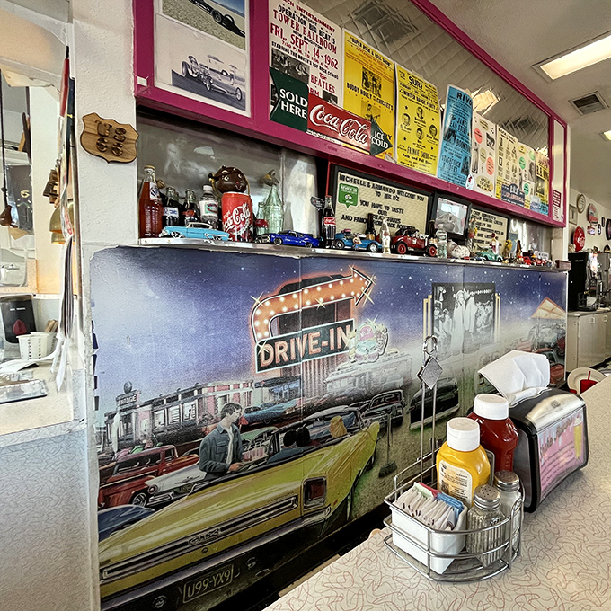 The counter area isn't just decorated with memorabilia—it's curated with the kind of Americana that makes you proud of diners.