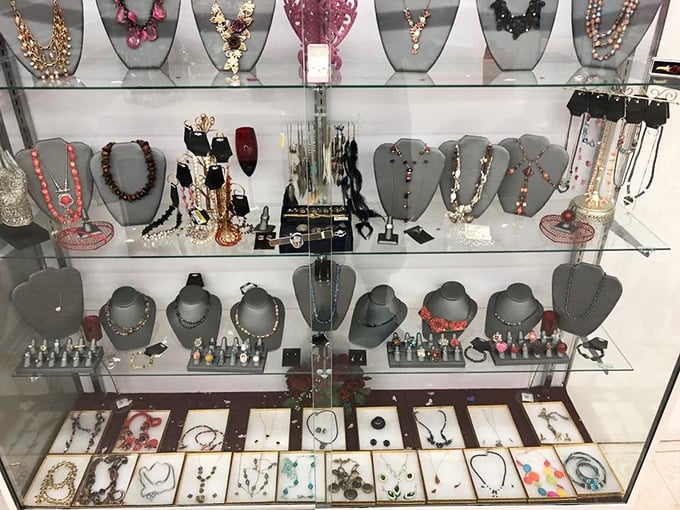 Behind glass, yesterday's accessories await tomorrow's outfits. Each necklace and bracelet holds stories from previous lives and celebrations.