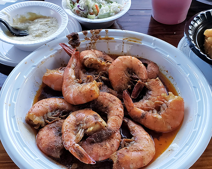 These aren't just shrimp—they're little pink crescents of joy swimming in a sauce worth bottling and taking home.