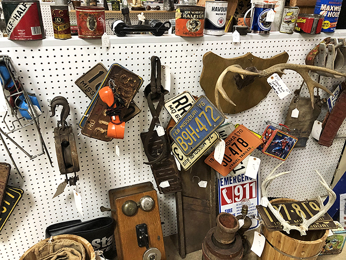License plates, vintage telephones, and rusty treasures – the ultimate man cave starter kit. One person's junk is another's conversation piece.