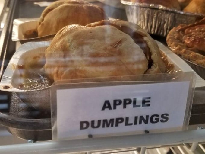 Apple dumplings that look like they're auditioning for a Norman Rockwell painting – golden, glistening, and absolutely irresistible.
