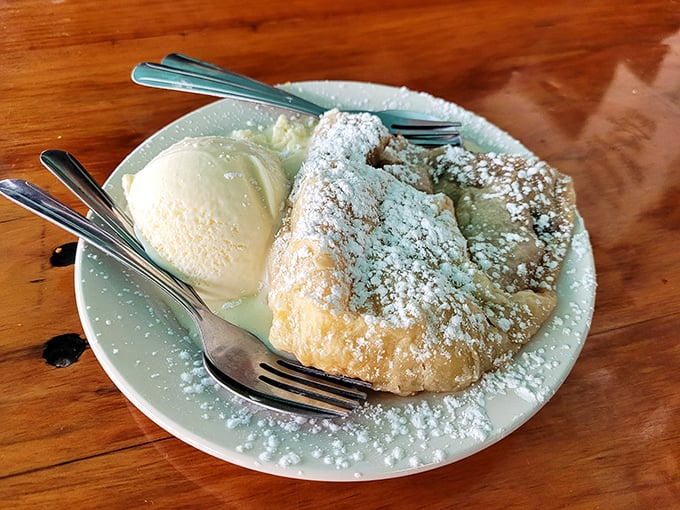 Apple strudel's flaky layers wrap autumn spices in pastry perfection that defines traditional German dessert artistry.