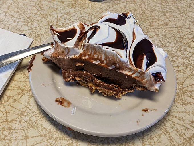 Chocolate cream pie with peaks of meringue that would make the Alps jealous. One bite explains why dessert here isn't an afterthought.