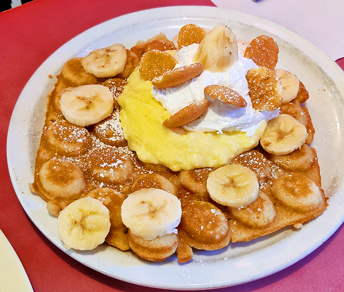 Whoever invented this banana-topped waffle creation deserves a Nobel Prize in breakfast innovation. Sweet, crispy, and utterly irresistible.